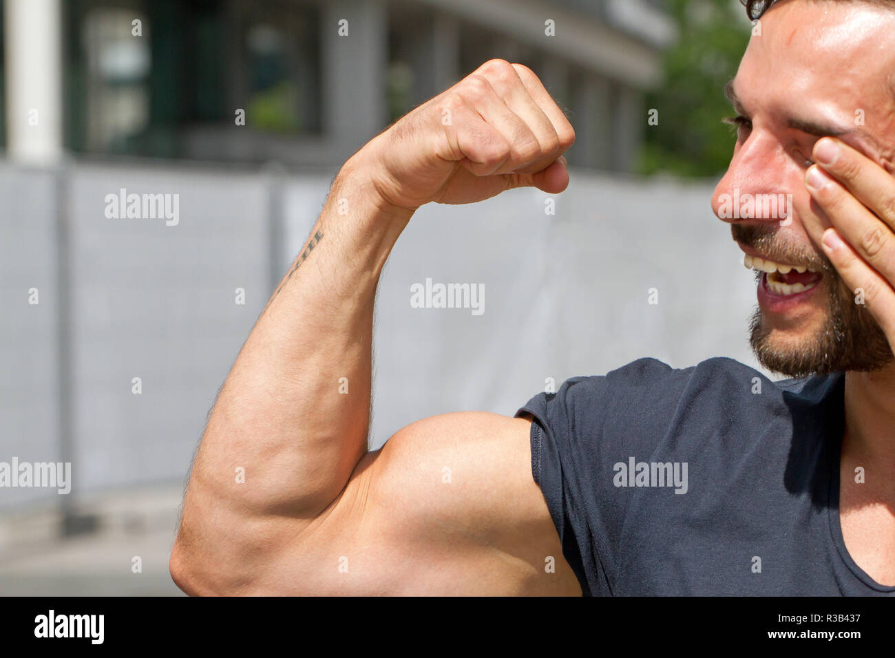 strong man laughing Stock Photo - Alamy