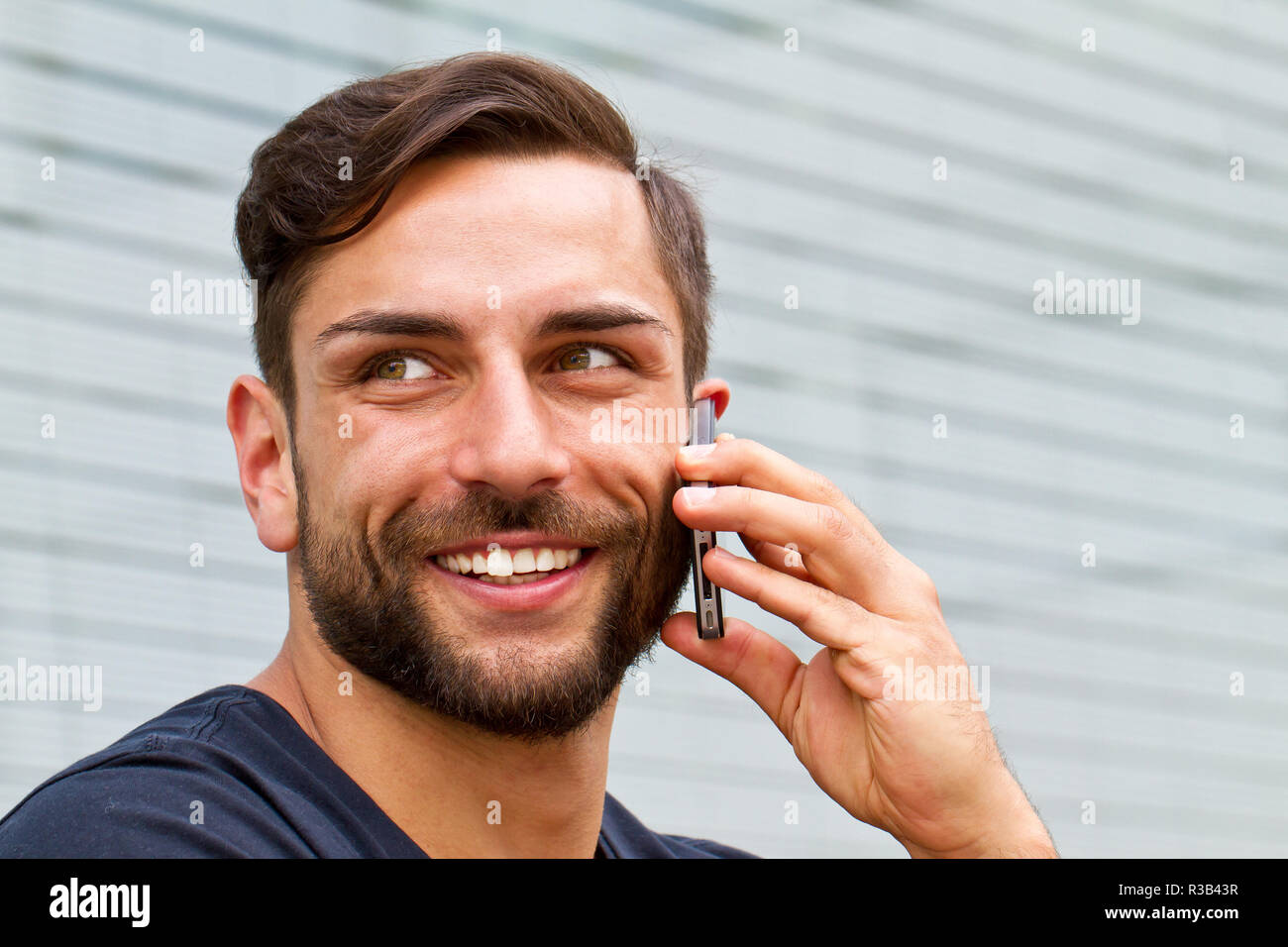 modern man with smartphone Stock Photo - Alamy