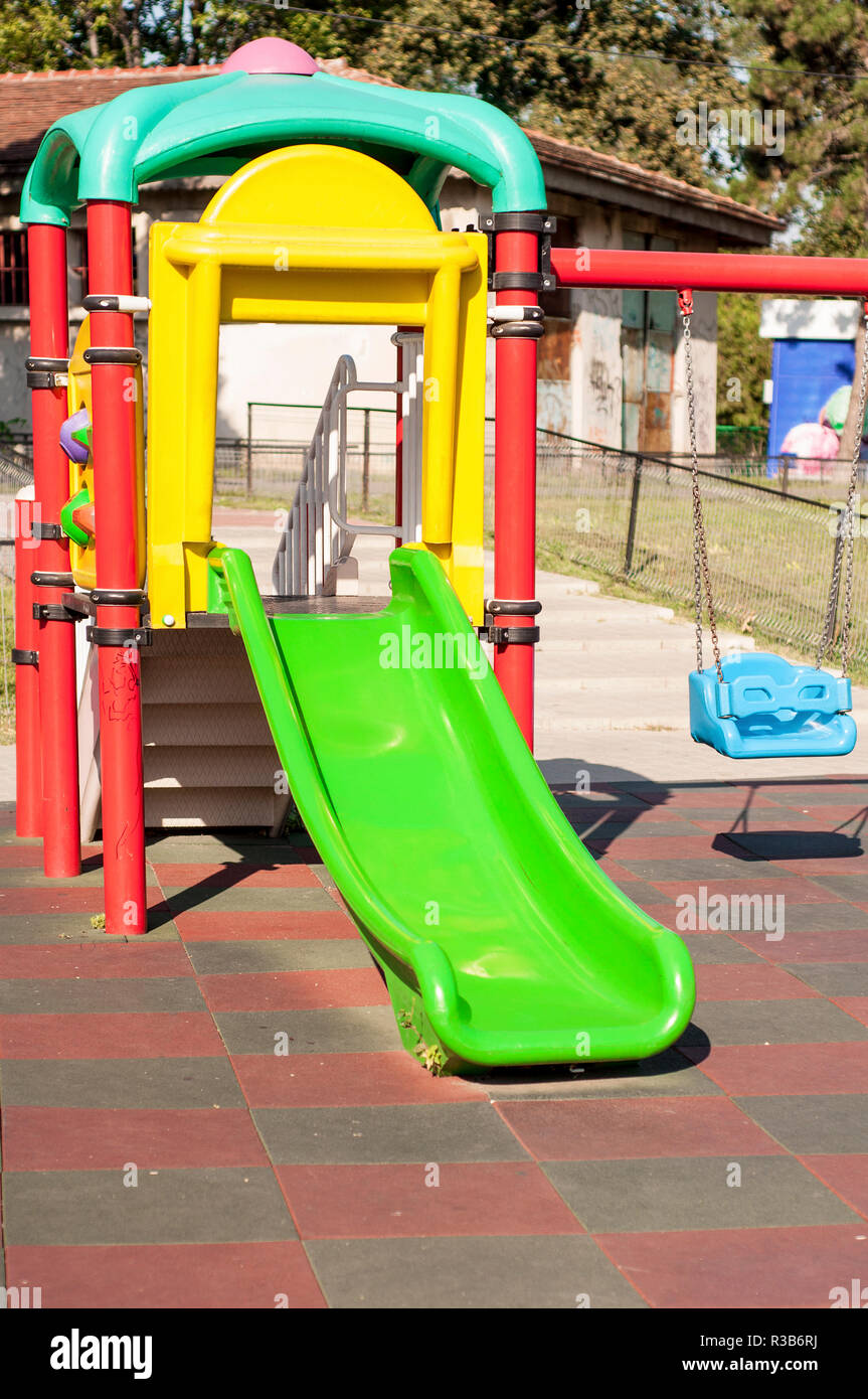 Playground swing slide hi-res stock photography and images - Alamy