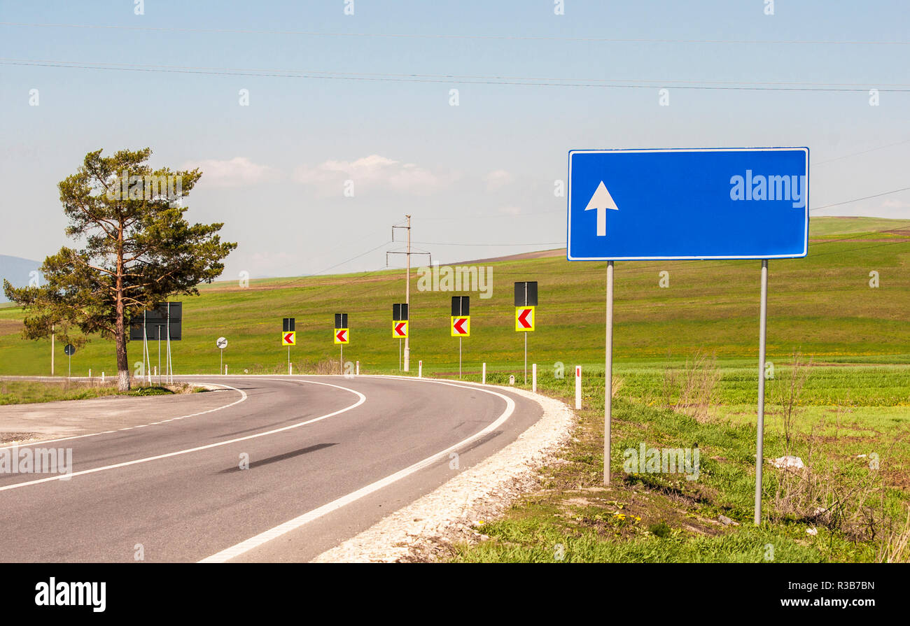 Highway in a rural area with road signs Stock Photo - Alamy