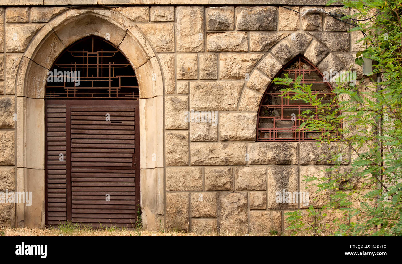 Old gothic wrought iron gate and window Stock Photo - Alamy