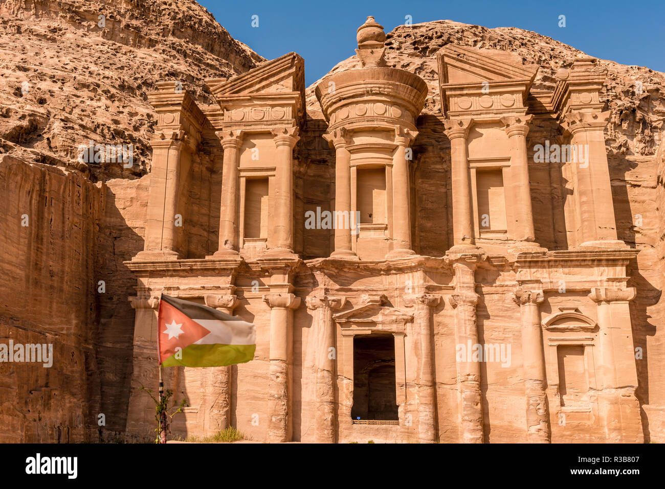 Jordanian flag, monastery, rock temple Ad Deir, rock tomb, Nabataean ...