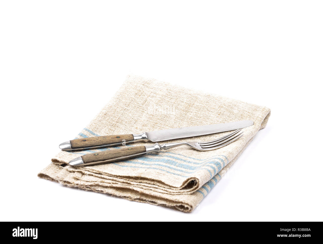 antique cutlery on linen cloth Stock Photo - Alamy