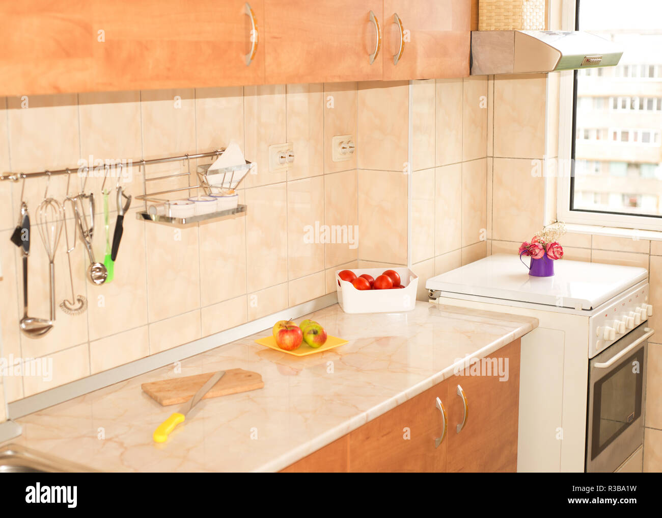 Empty kitchen interior with cupboards and cooker Stock Photo - Alamy