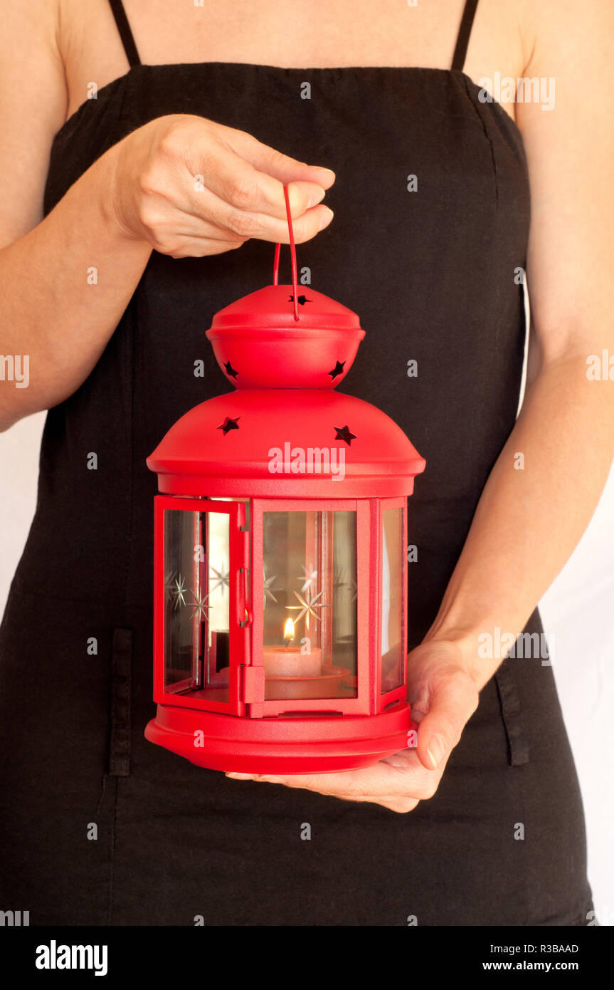 Hand holding lantern hi-res stock photography and images - Alamy