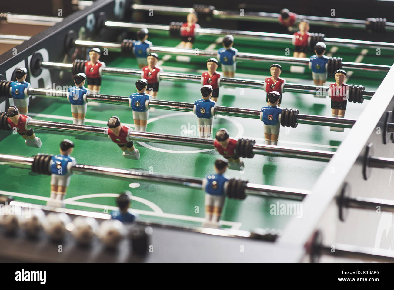 Table football in the entertainment center. Close-up image of plastic ...
