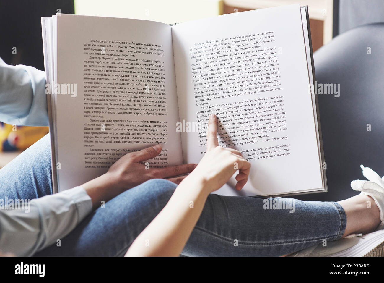 Reading a book at a cafe hi-res stock photography and images - Alamy