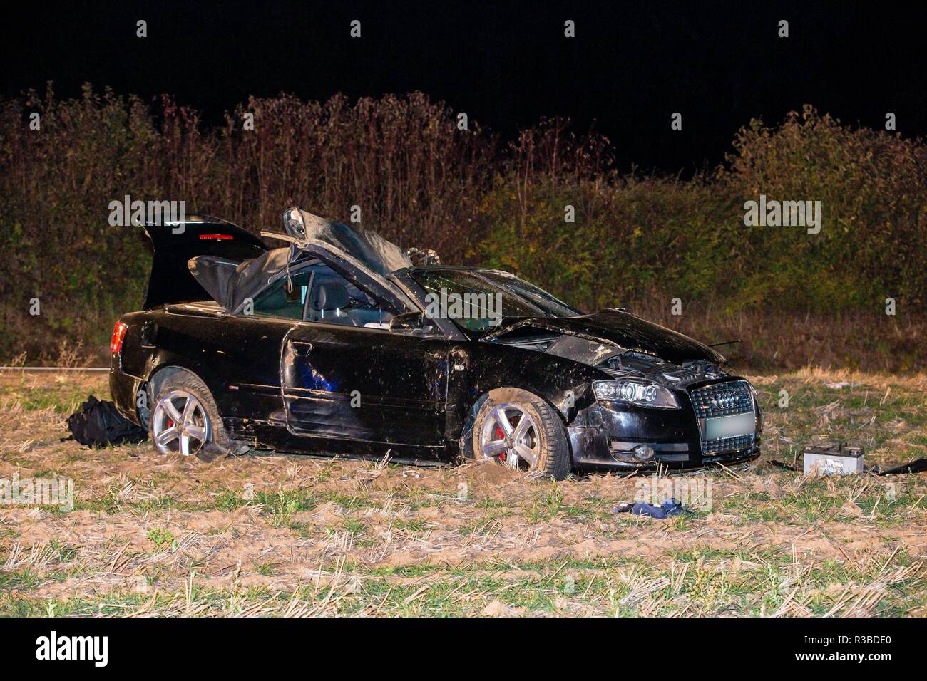 Scenery of a deadly accident on a country road by night: overturned ...
