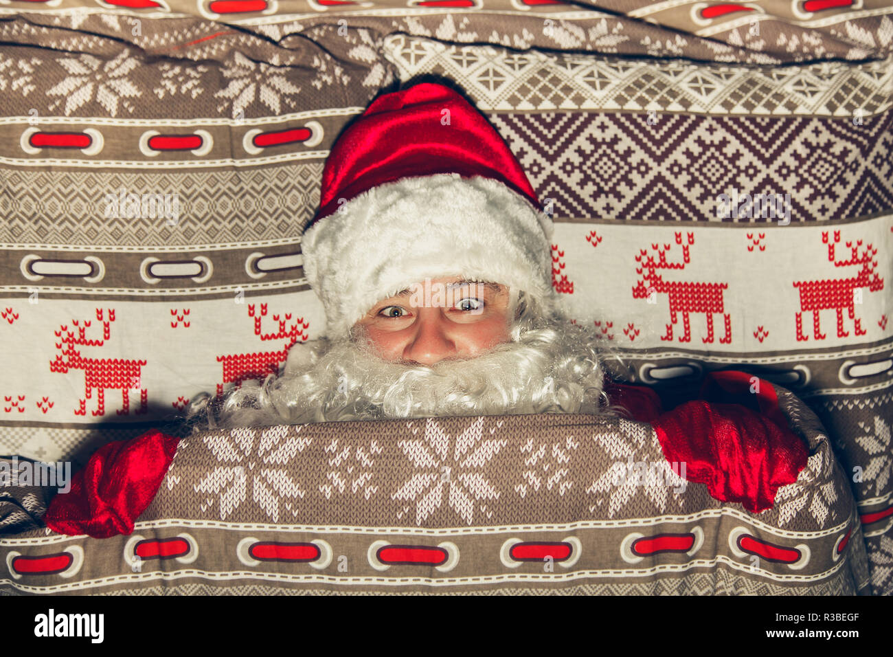 Authentic Santa Claus is lying in bed at home. Santa is resting Stock ...