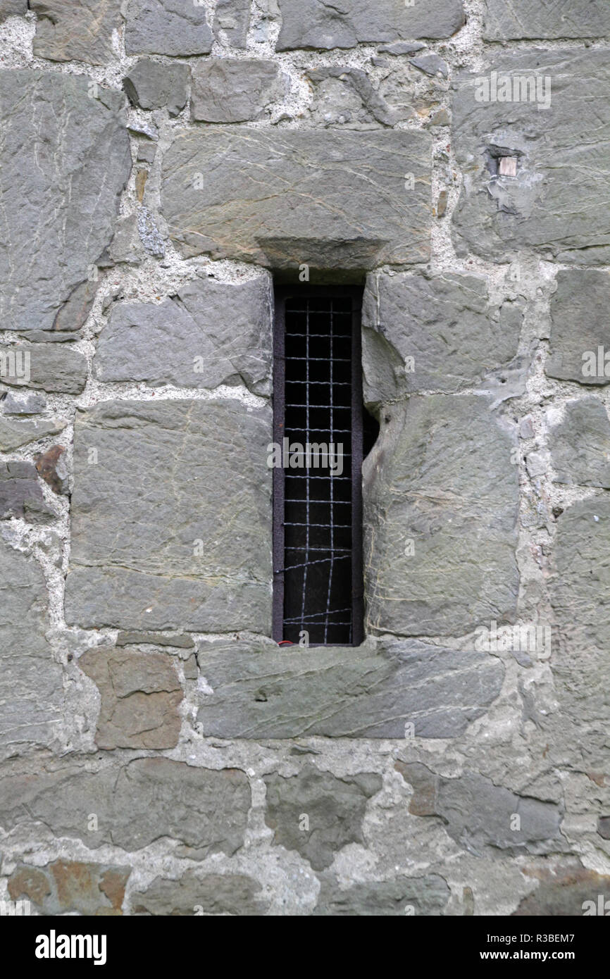 narrow barred window opening Stock Photo - Alamy