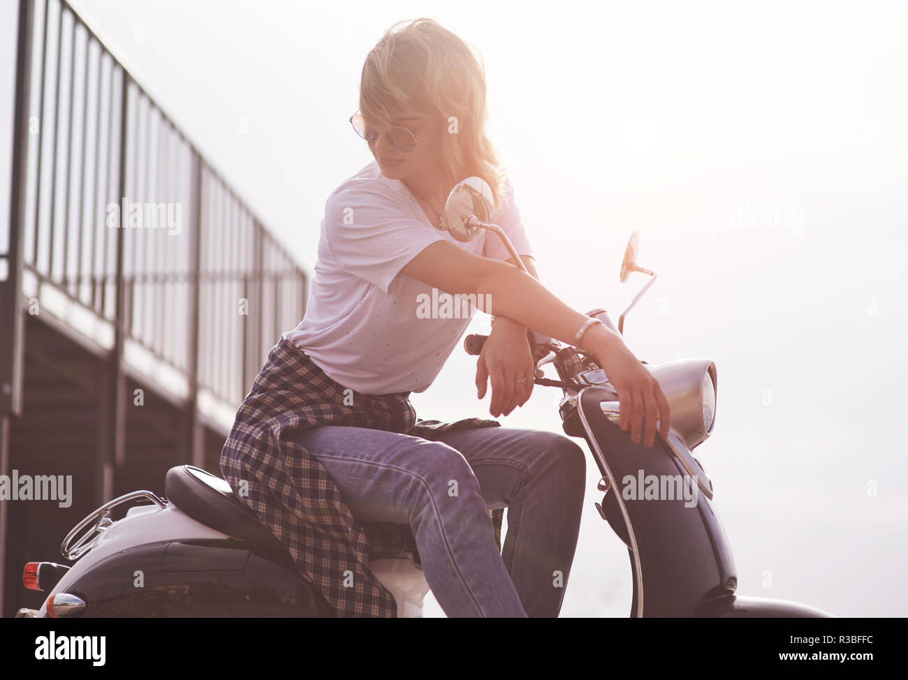 Girl Sitting On Moped High Resolution Stock Photography and Images - Alamy