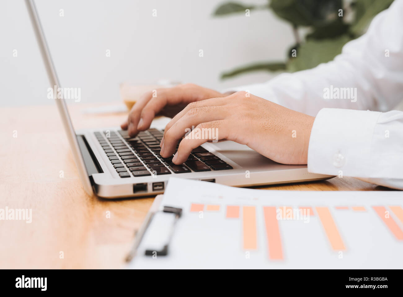 Business man using laptop documents hi-res stock photography and images ...