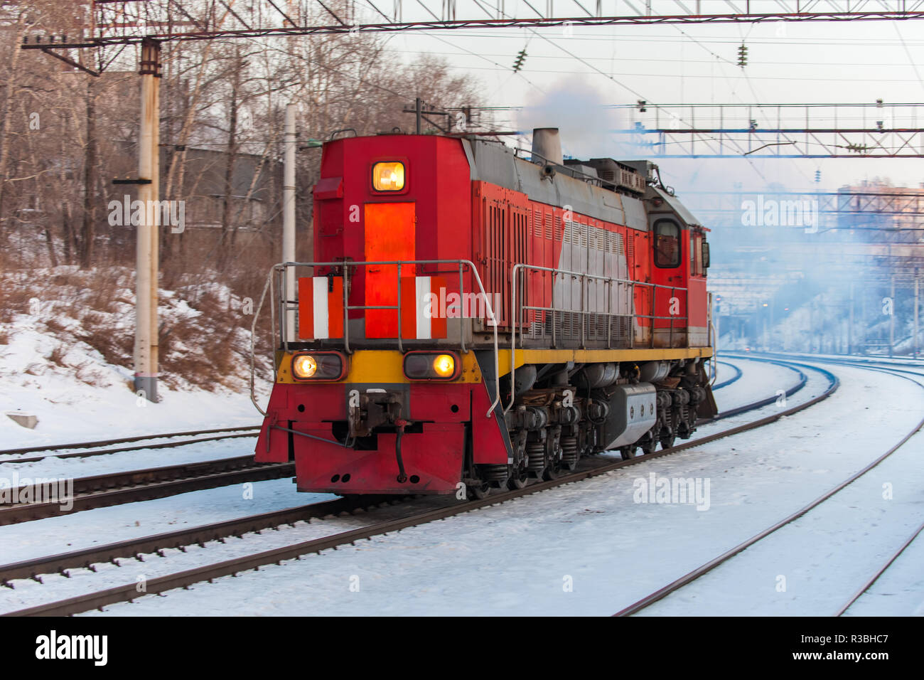 Red diesel engine shunting locomotive on the railroad Stock Photo - Alamy