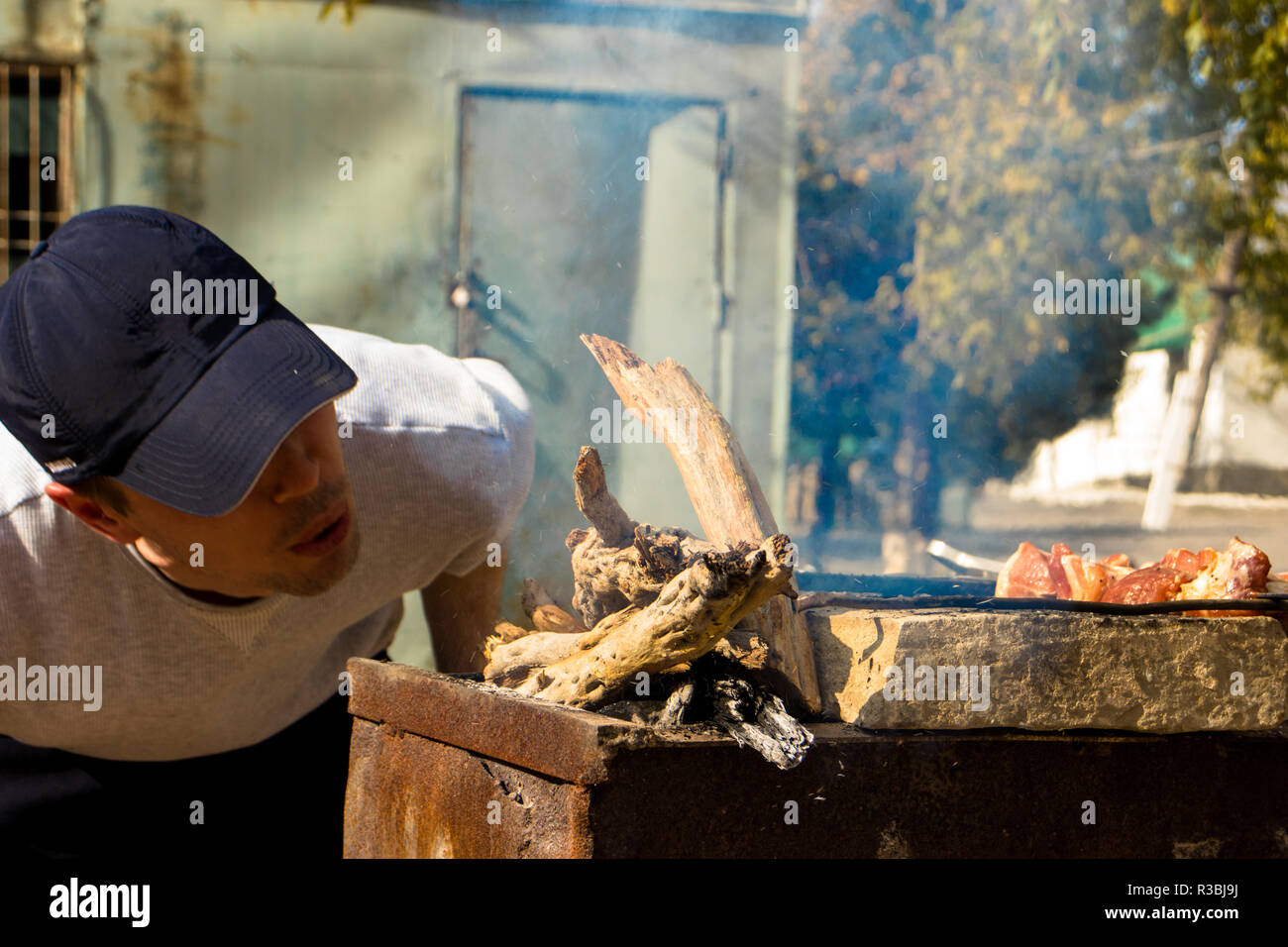 cooking traditional shashlik (barbeque) in Turkmenistan Stock Photo - Alamy