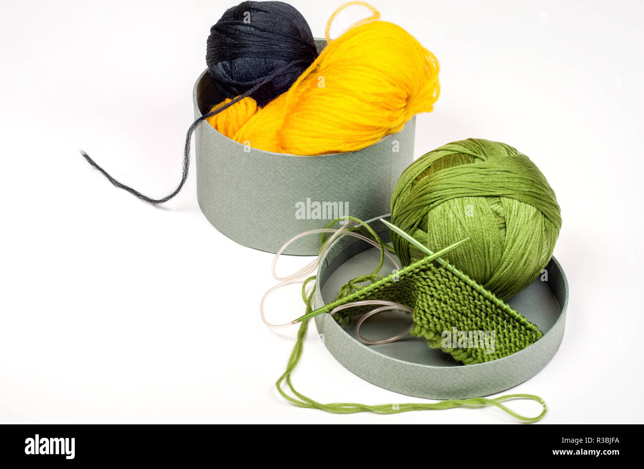 Colorful thread balls in a box on white background Stock Photo - Alamy