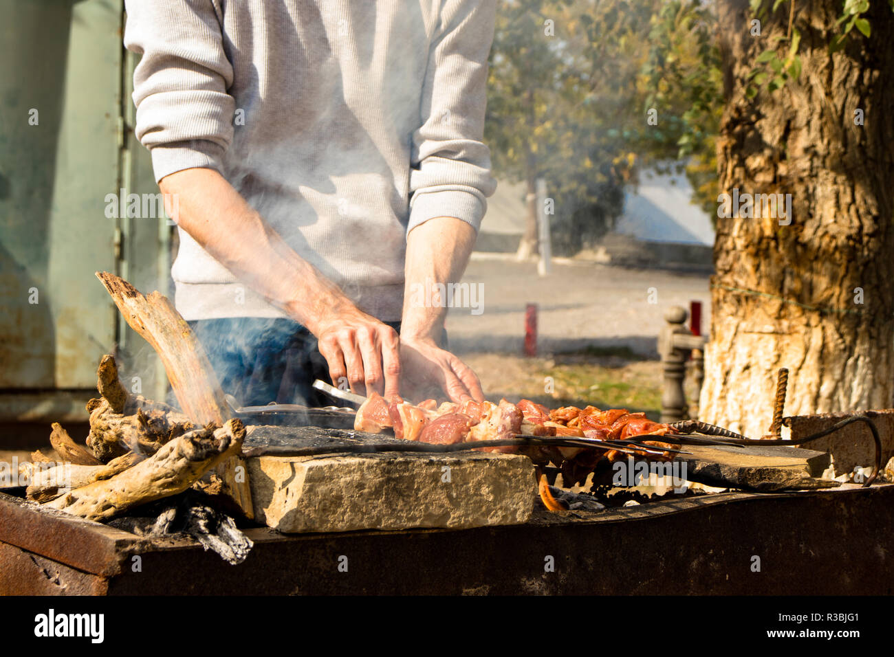 cooking traditional shashlik (barbeque) in Turkmenistan Stock Photo - Alamy
