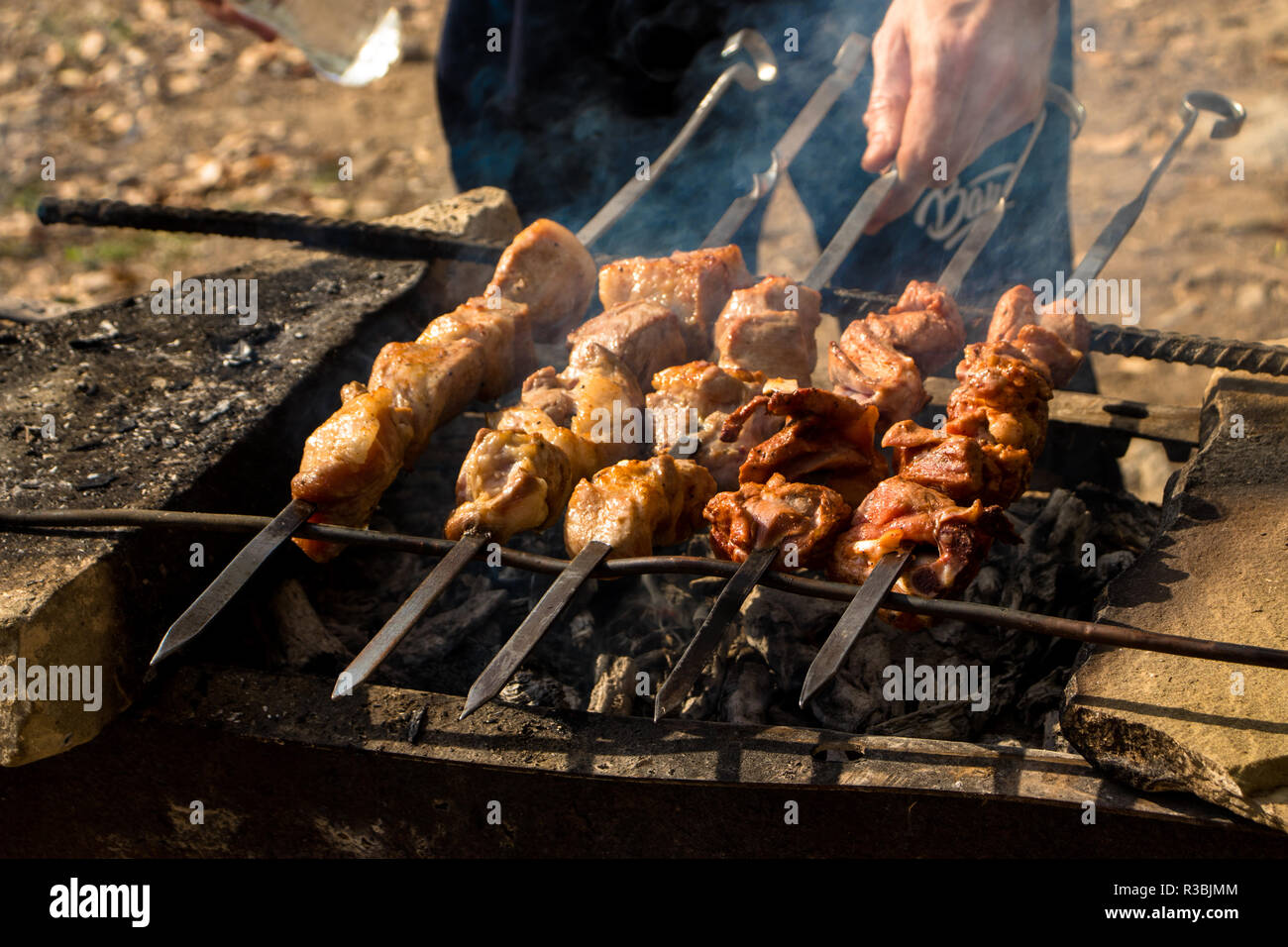 cooking traditional shashlik (barbeque) in Turkmenistan Stock Photo - Alamy