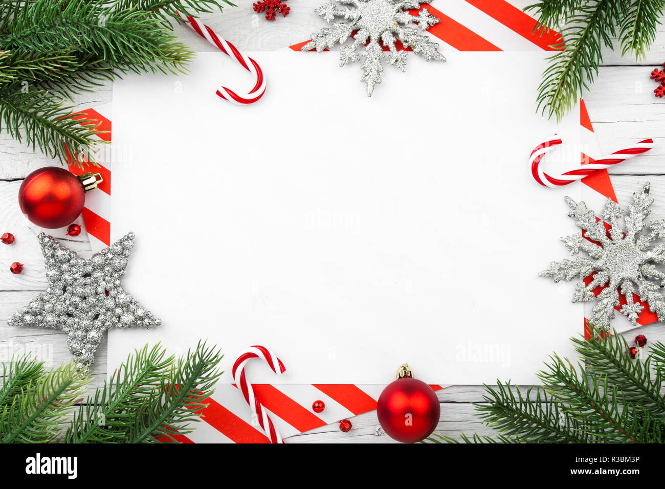 Christmas Border - tree branches with balls, candy and star. New Year ...