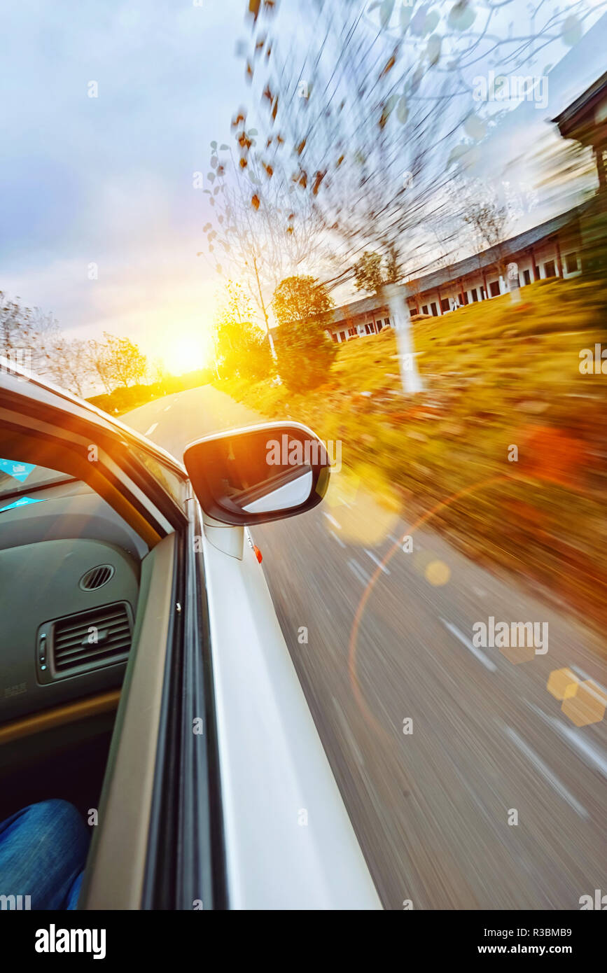 A car driving on a motorway at high speeds Stock Photo - Alamy