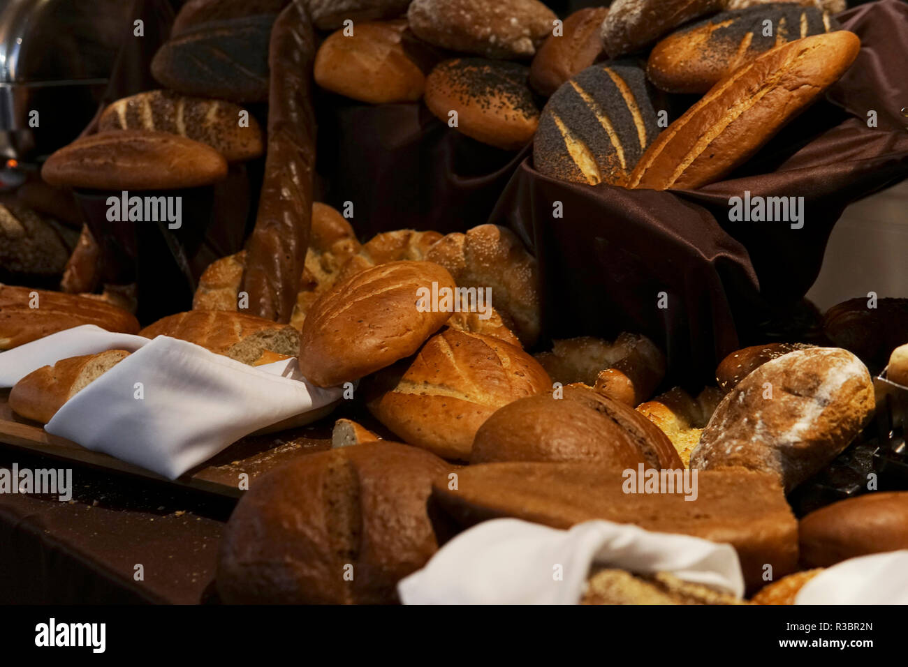 many rolls of different breads in the bakery restaurant Stock Photo - Alamy