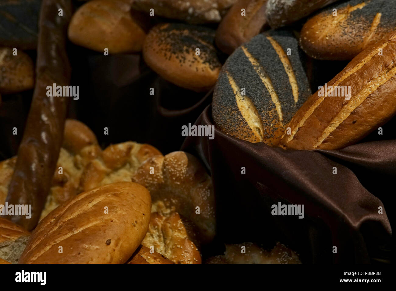 many rolls of different breads in the bakery restaurant Stock Photo - Alamy