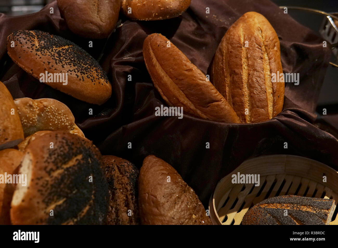 many rolls of different breads in the bakery restaurant Stock Photo - Alamy
