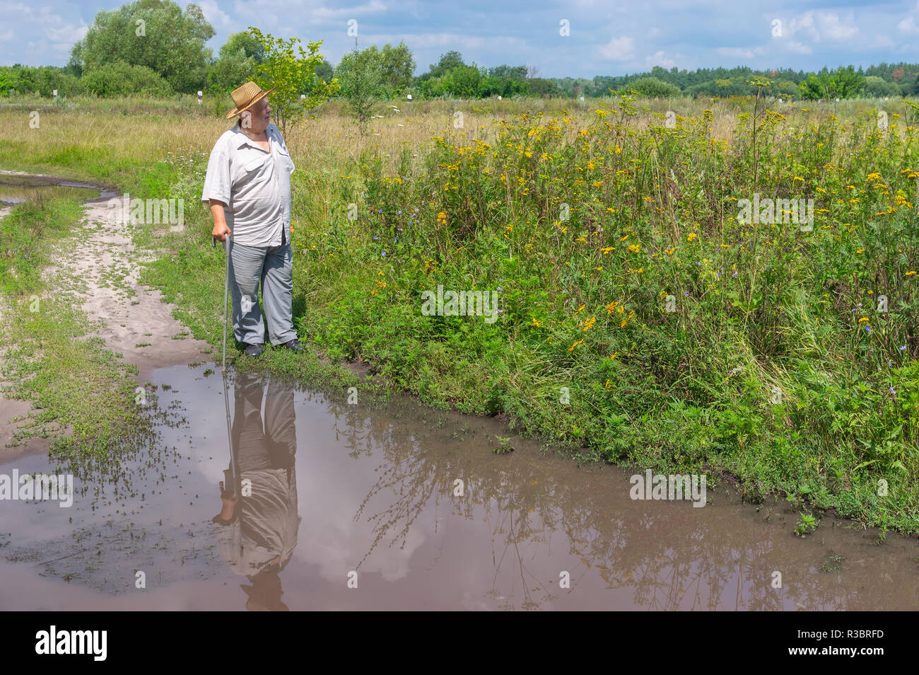 Puddle pool on road hi-res stock photography and images - Alamy