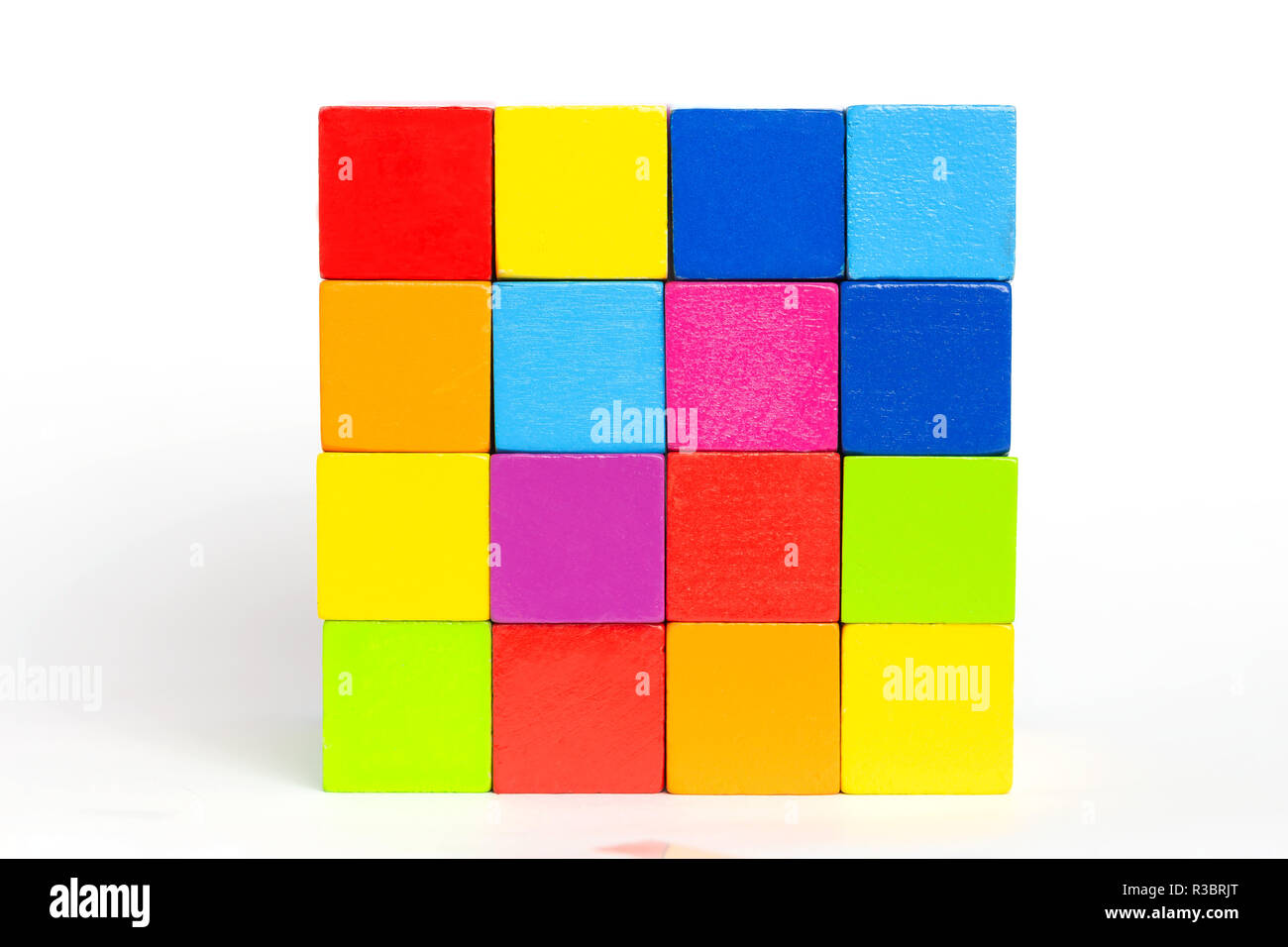 Colored wooden blocks, cubes, build on a light white background.A cube ...