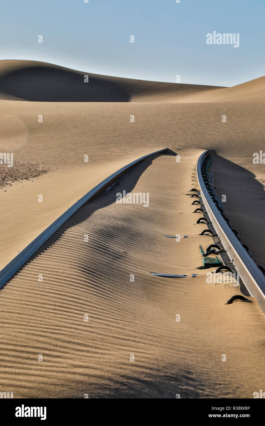 Africa, Namibia, Garub, Railroad Tracks and Drifted Sand Stock Photo ...
