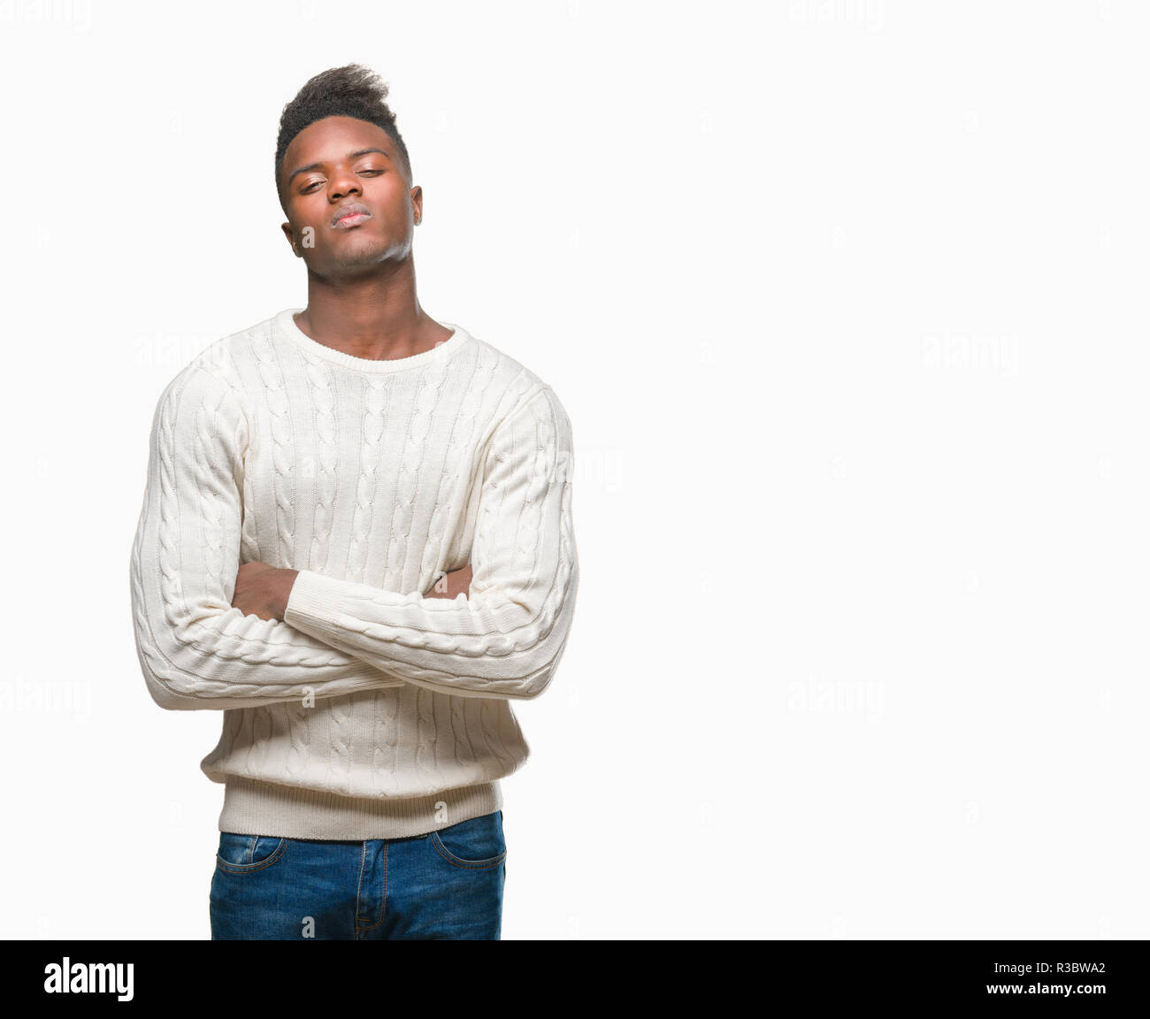 Young african american man over isolated background skeptic and nervous ...