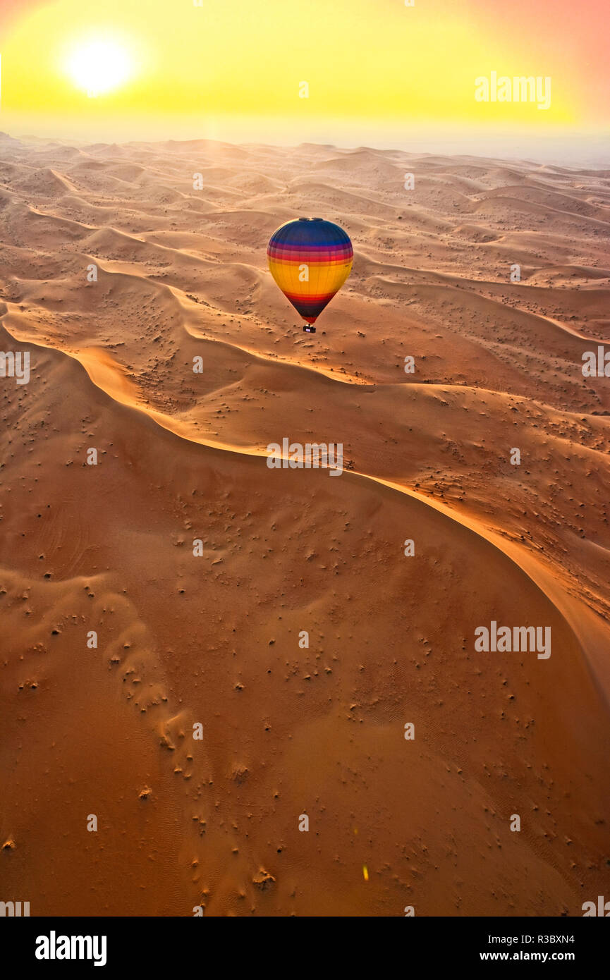Aerial view of the sand dunes of the Arabian Desert next to Dubai at ...