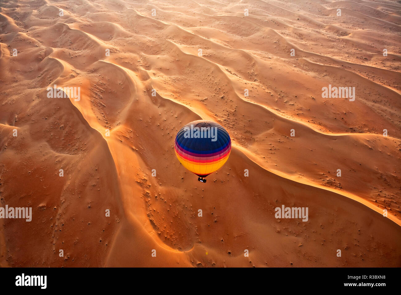 Aerial view of the sand dunes of the Arabian Desert next to Dubai ...