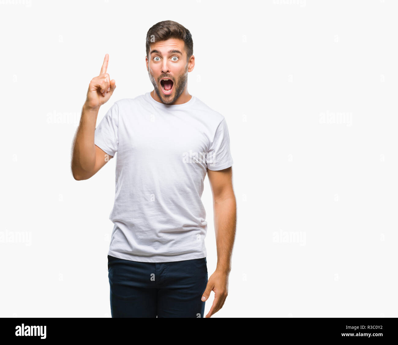 Young handsome man over isolated background pointing finger up with ...