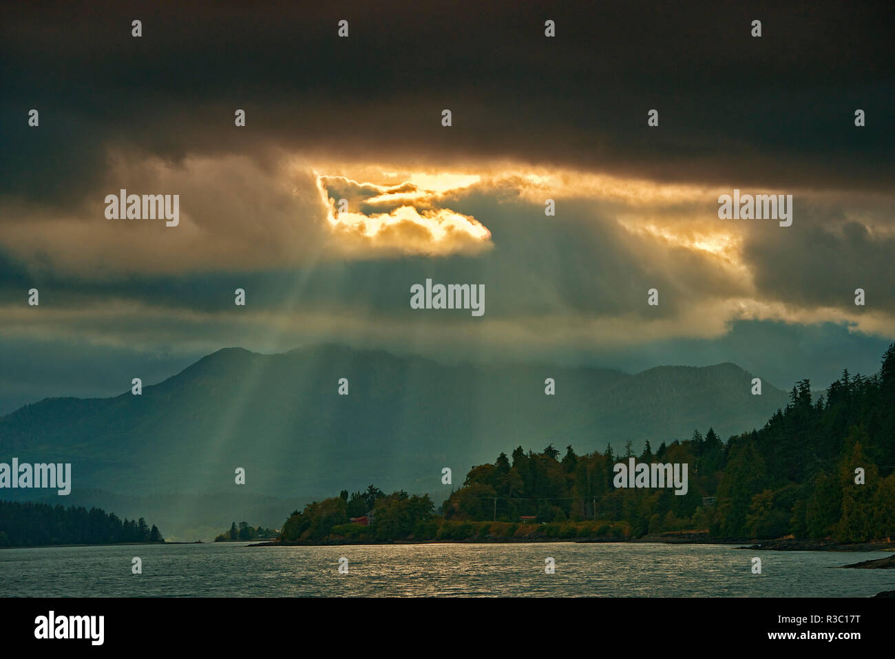 Sun rays through storm clouds hi-res stock photography and images - Alamy