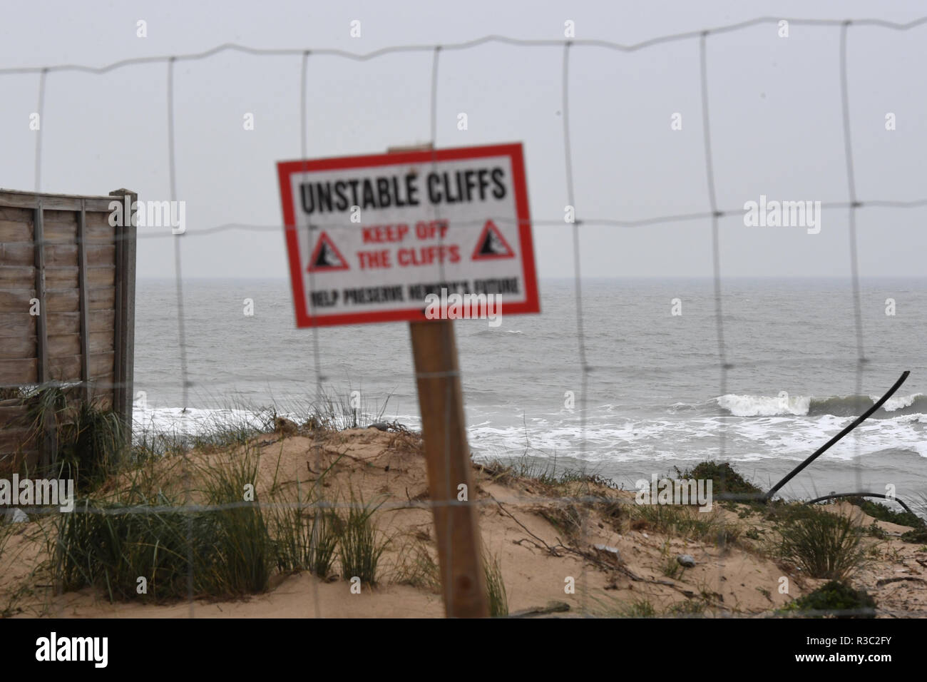 A warning sign on the cliff top at Hemsby in Norfolk, as former soldier ...