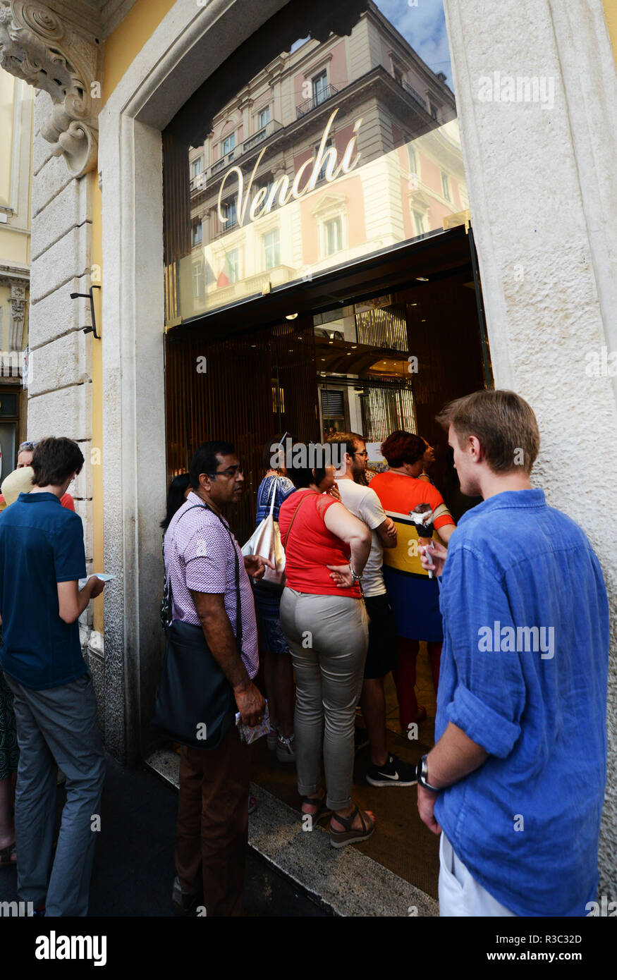 Enjoying his Italian Ice cream atthe Venchi gelateria in Rome Stock ...