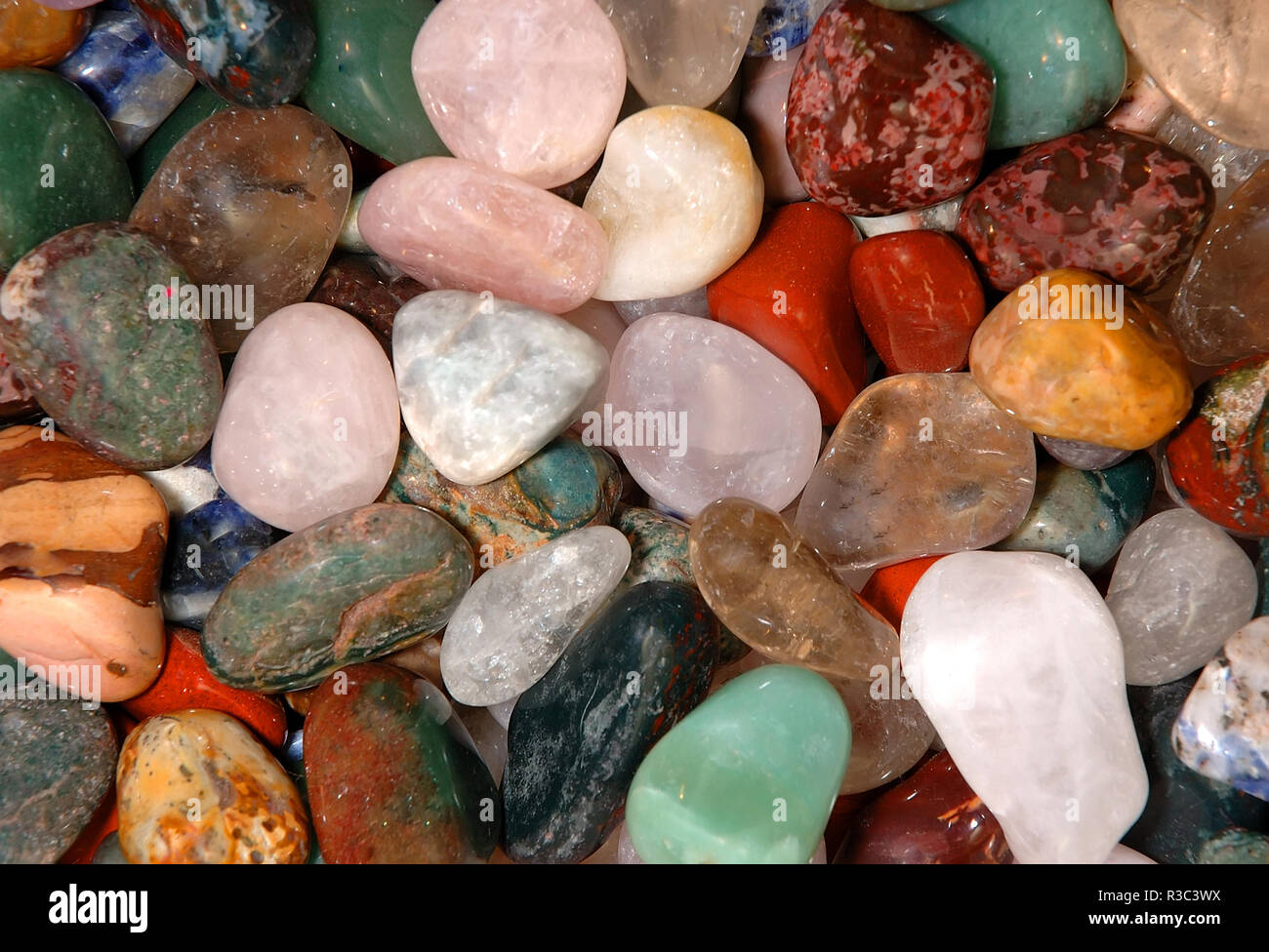 Texture, a mix of colored gemstones Stock Photo - Alamy