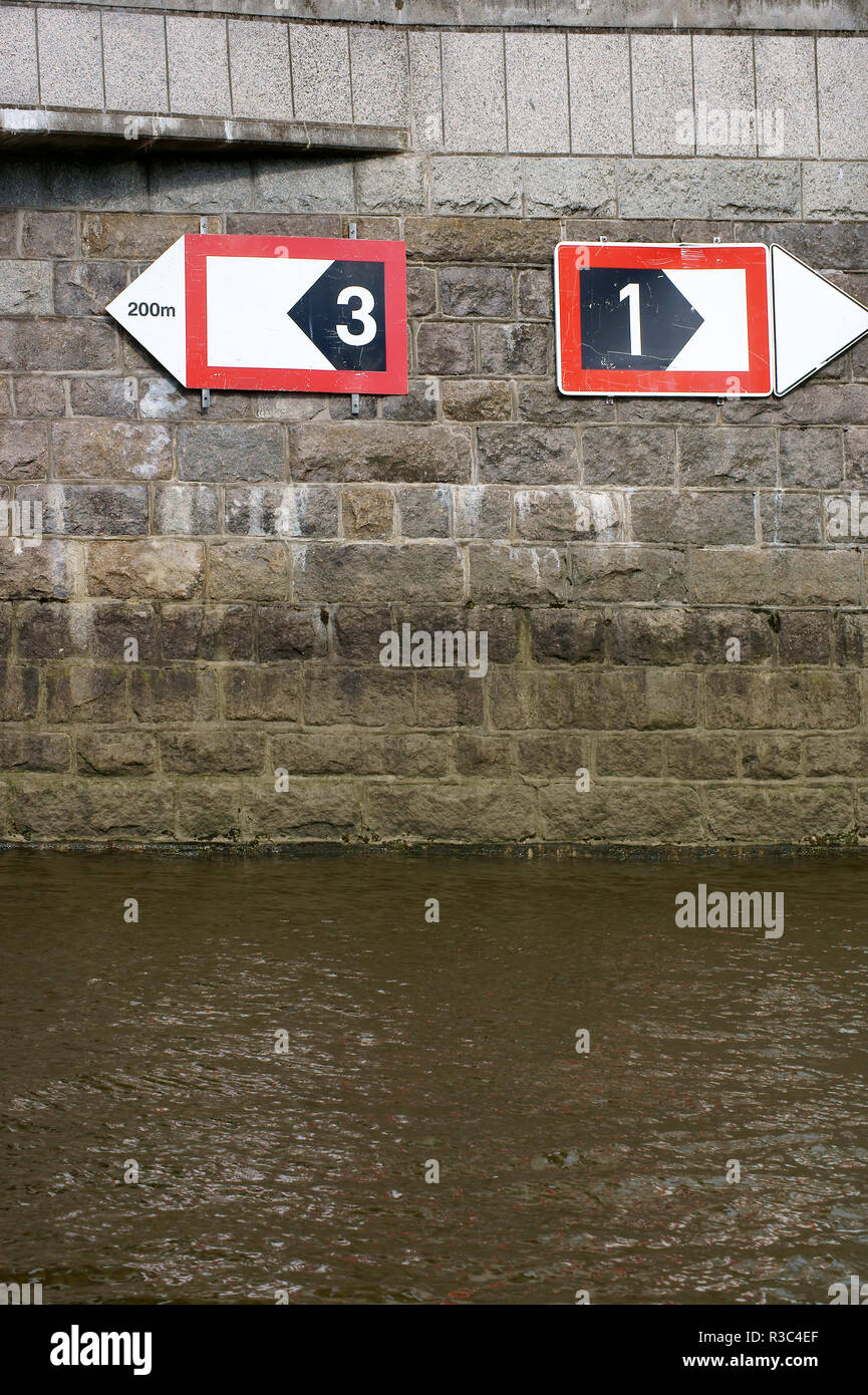 striking wall with arrow Stock Photo - Alamy