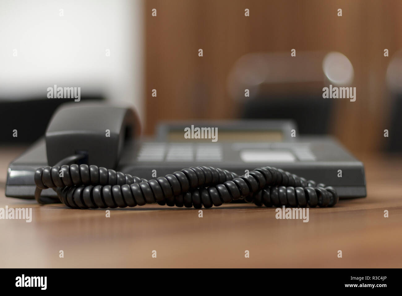 Waiting for phone to ring hi-res stock photography and images - Alamy