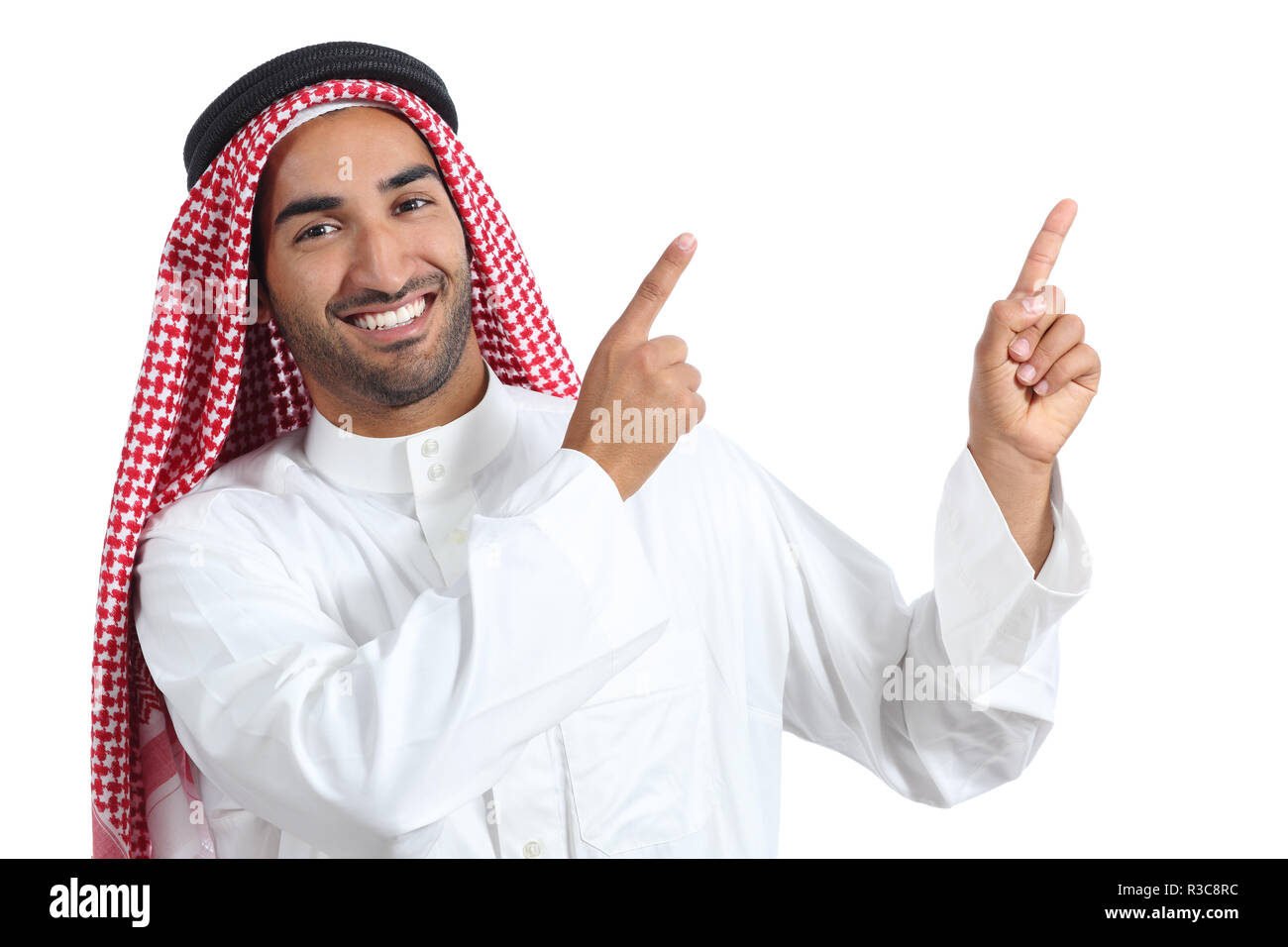 Arab saudi presenter man presenting pointing at side Stock Photo - Alamy