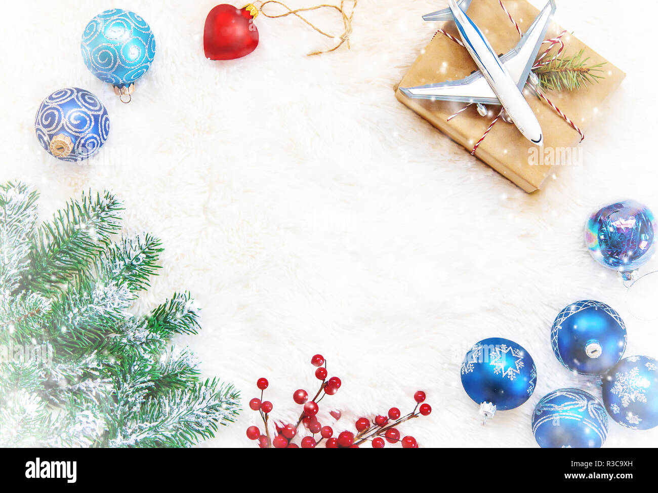 Christmas background on the theme of travel. The plane symbolizes the ...