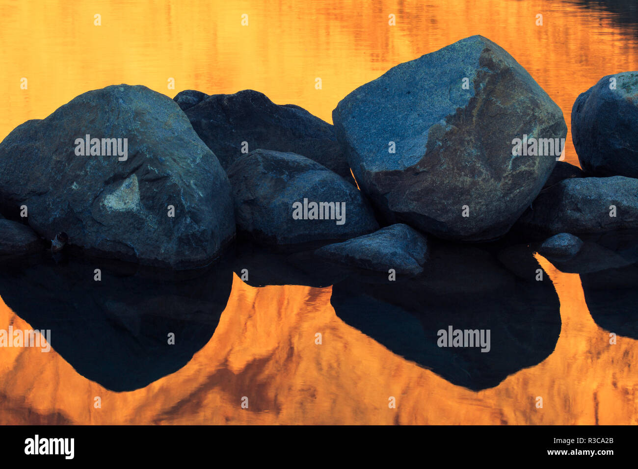 Boulders in Convict Lake at sunrise, Sherwin Range, Sierra Nevada ...