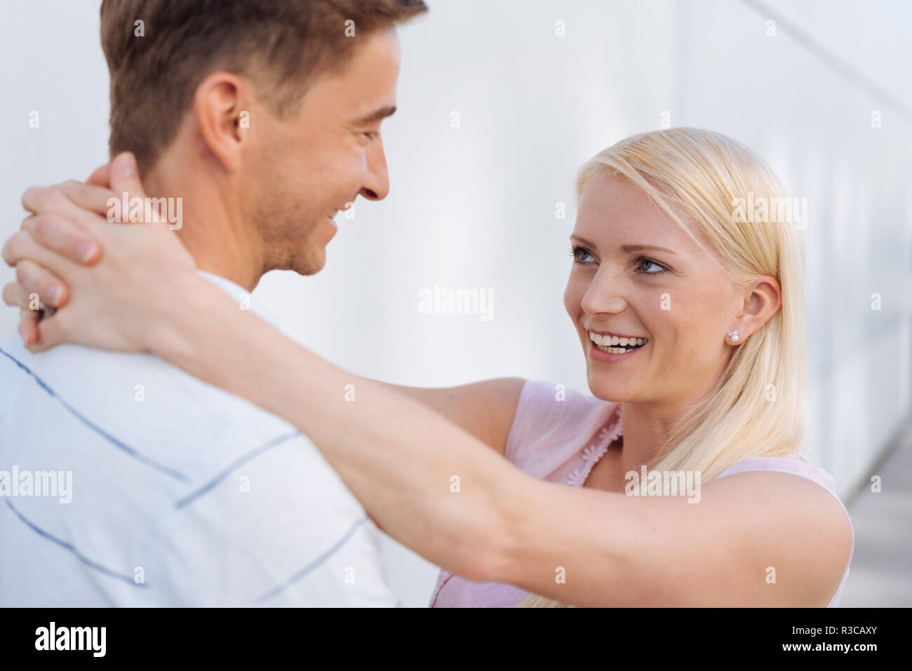 Arms around neck hi-res stock photography and images - Alamy