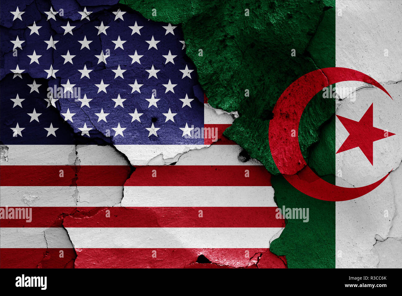 flags of USA and Algeria painted on cracked wall Stock Photo - Alamy