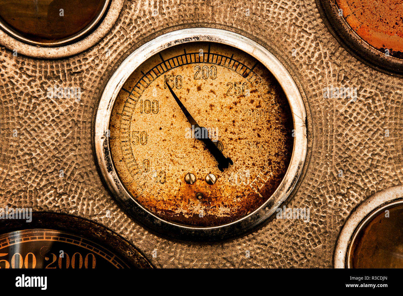 Vintage car’s control panel with speedometer. Sepia toned Stock Photo ...