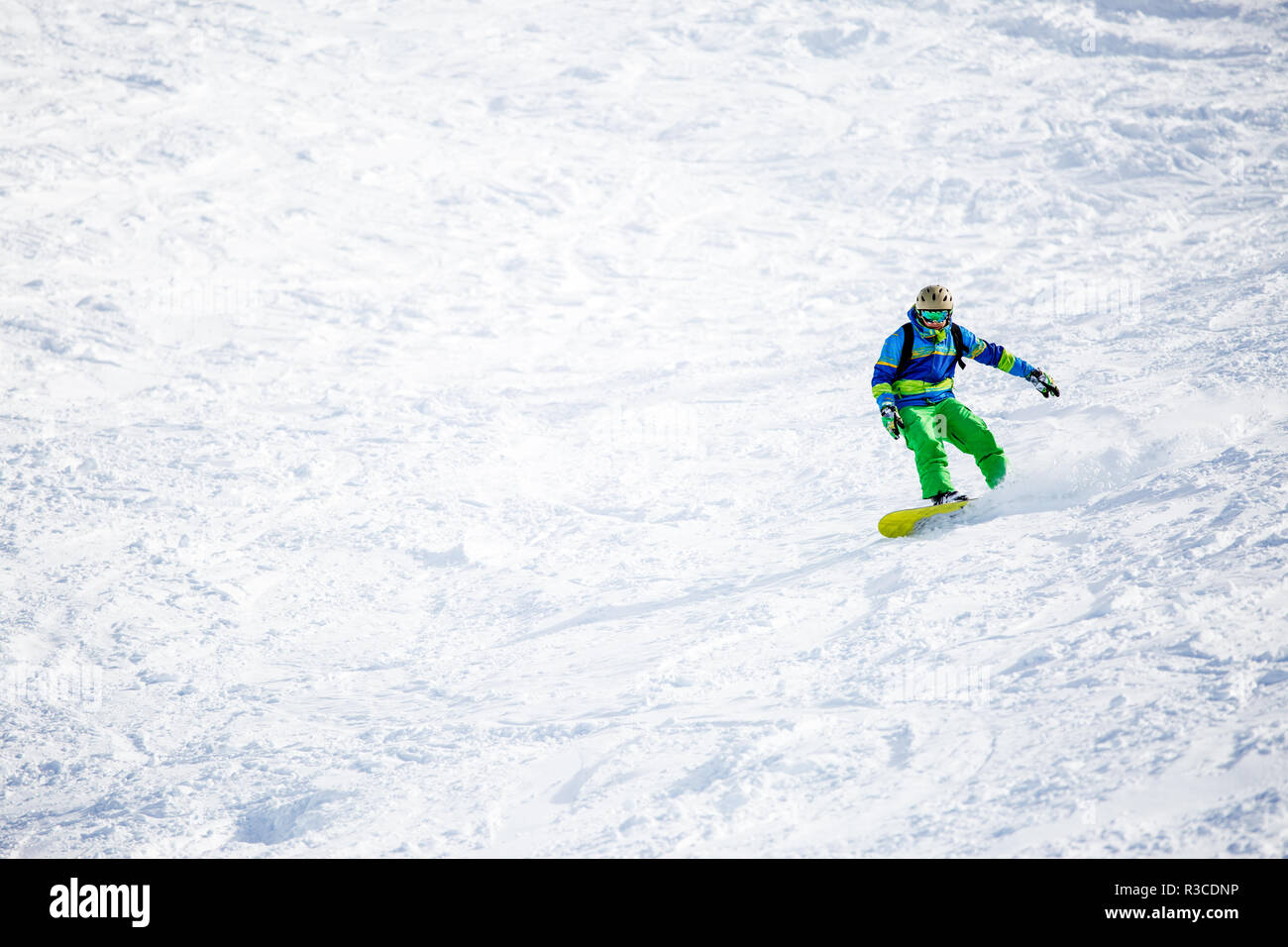 Snowboarder wearing helmet glasses hi-res stock photography and images ...