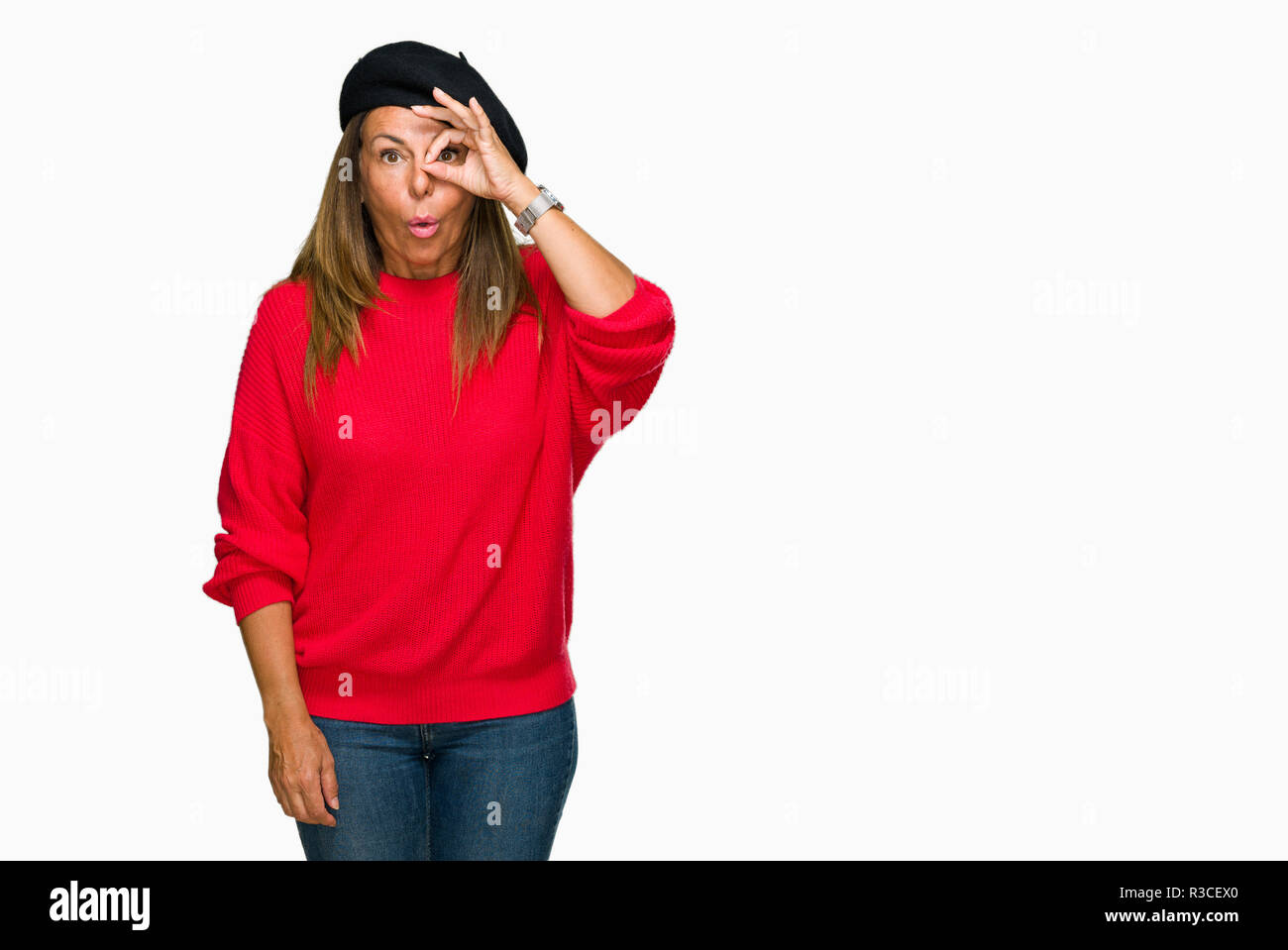 Middle age adult woman wearing fashion beret over isolated background ...