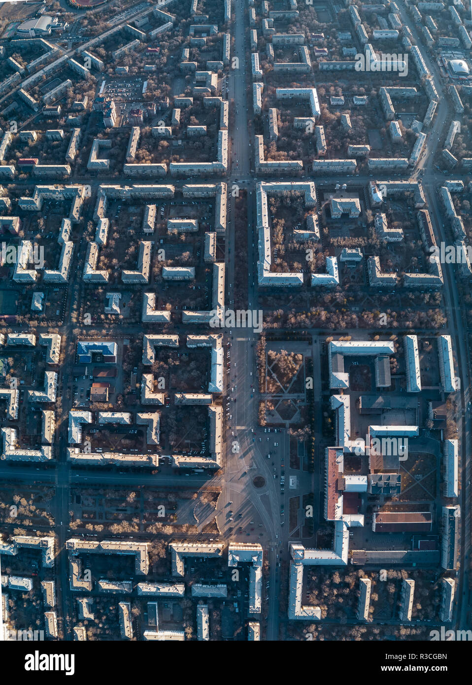 Aerial view of cityscape; top down drone shot; smooth rows of houses ...