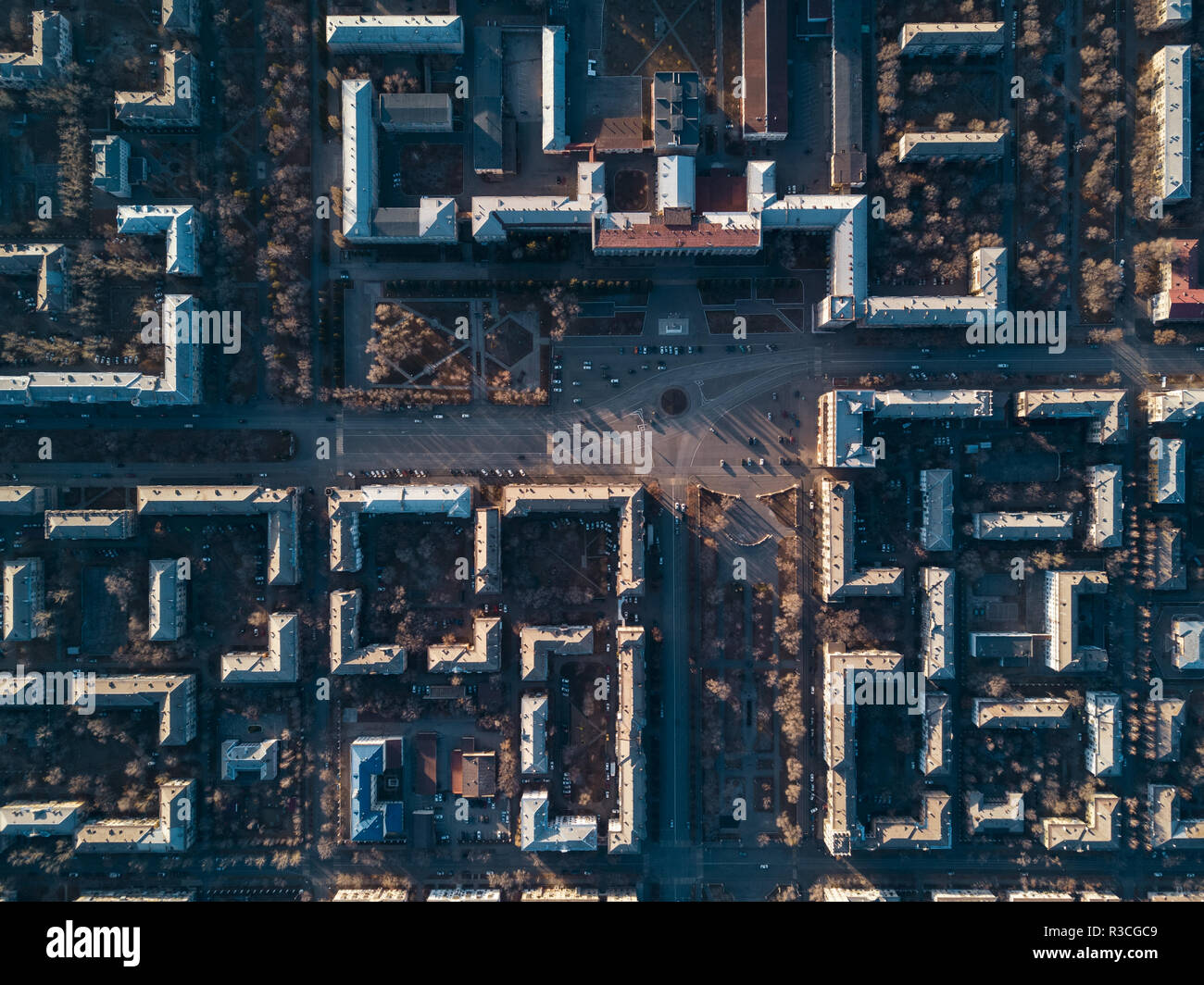 Aerial view of cityscape; top down drone shot; smooth rows of houses ...