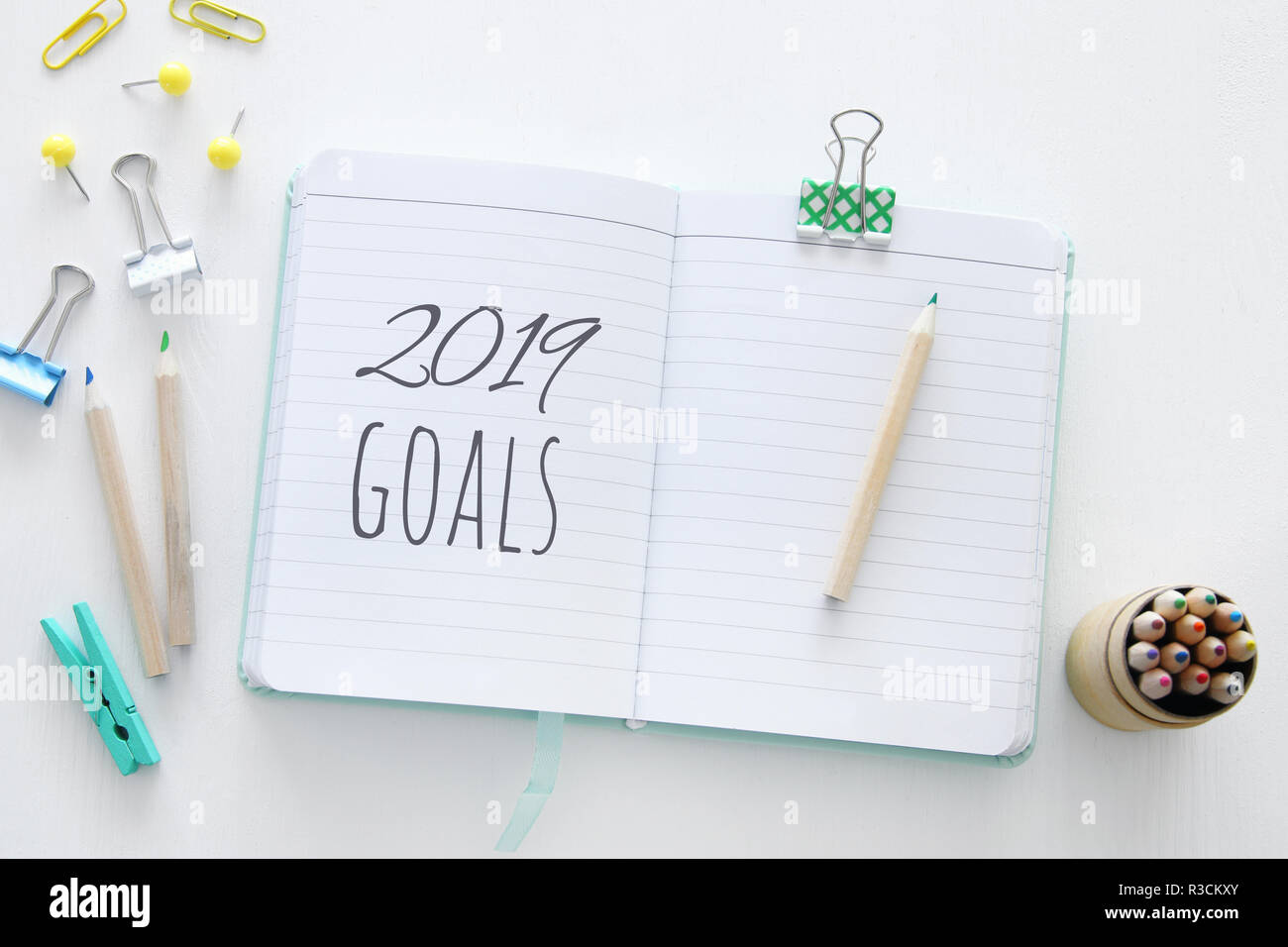 Top view 2019 goals list with notebook over white wooden desk Stock ...